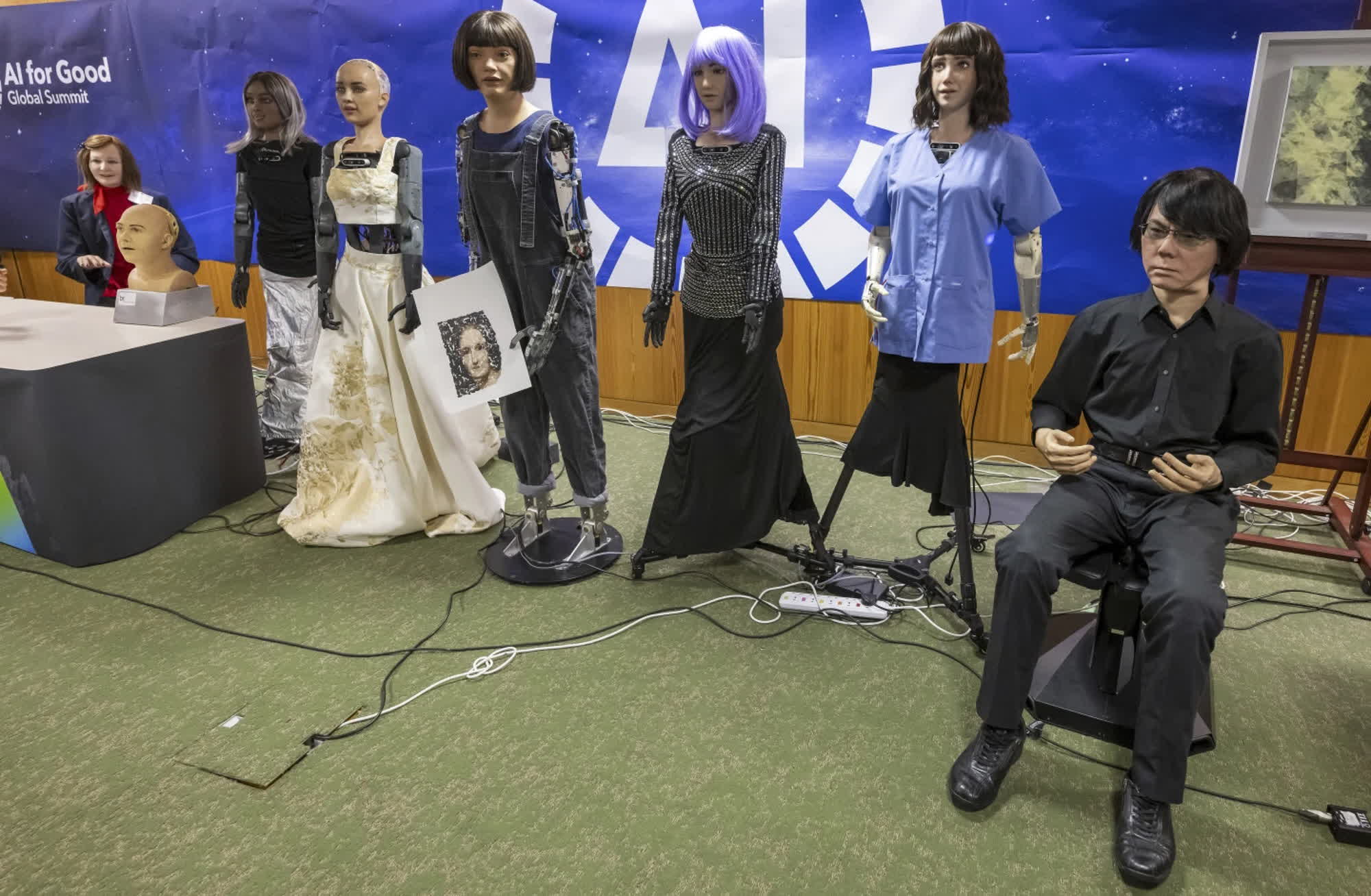 A creepy collective of nine AI robots showcased at UN news conference ... A creepy collective of nine AI robots showcased at UN news conference ...