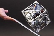 This robotic cube can balance on its edge, stand on a corner and even ...