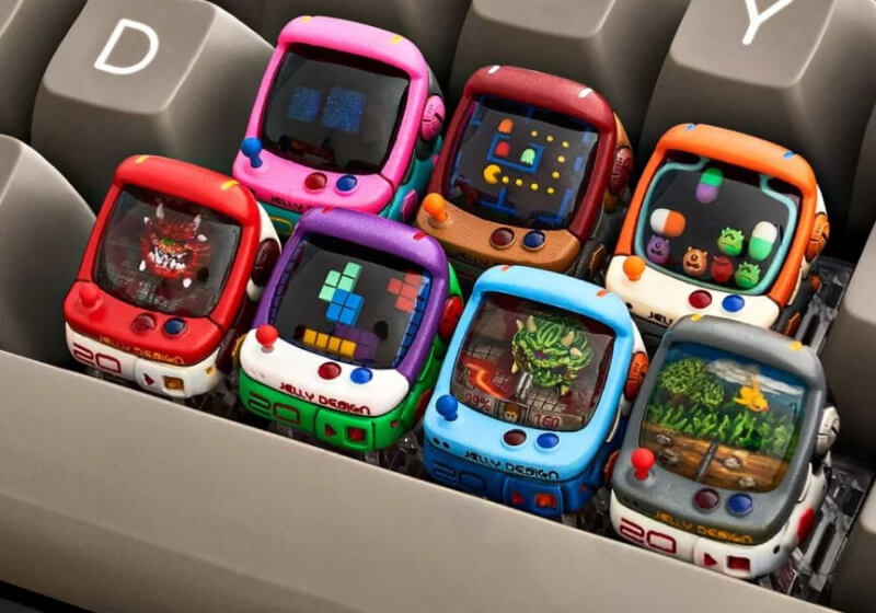 These custom Jelly Key keycaps are modeled after classic arcade games ...