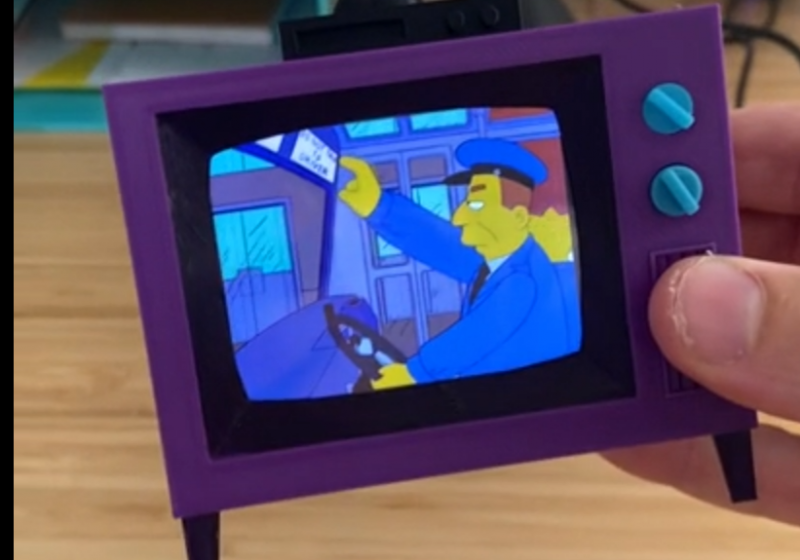 Check out this tiny Simpsons TV that plays random episodes of the show ...