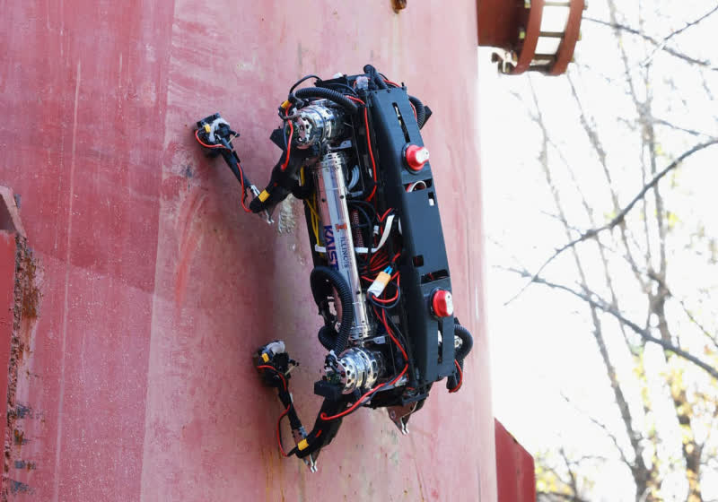 Quadruped robot with magnetic feet can climb walls and traverse ...